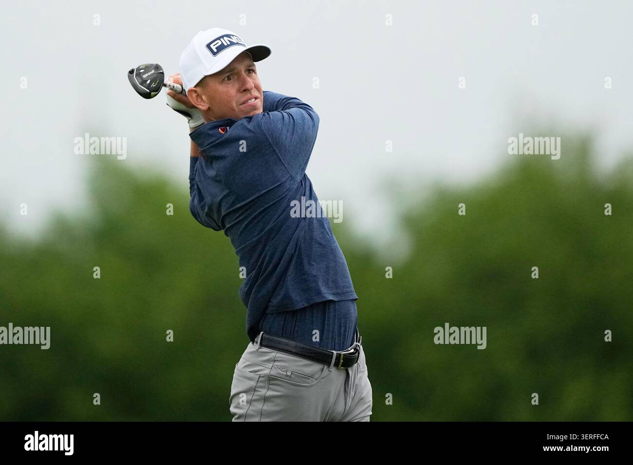 Sam Stevens watches his tee shot on the 13th hole during the first ...