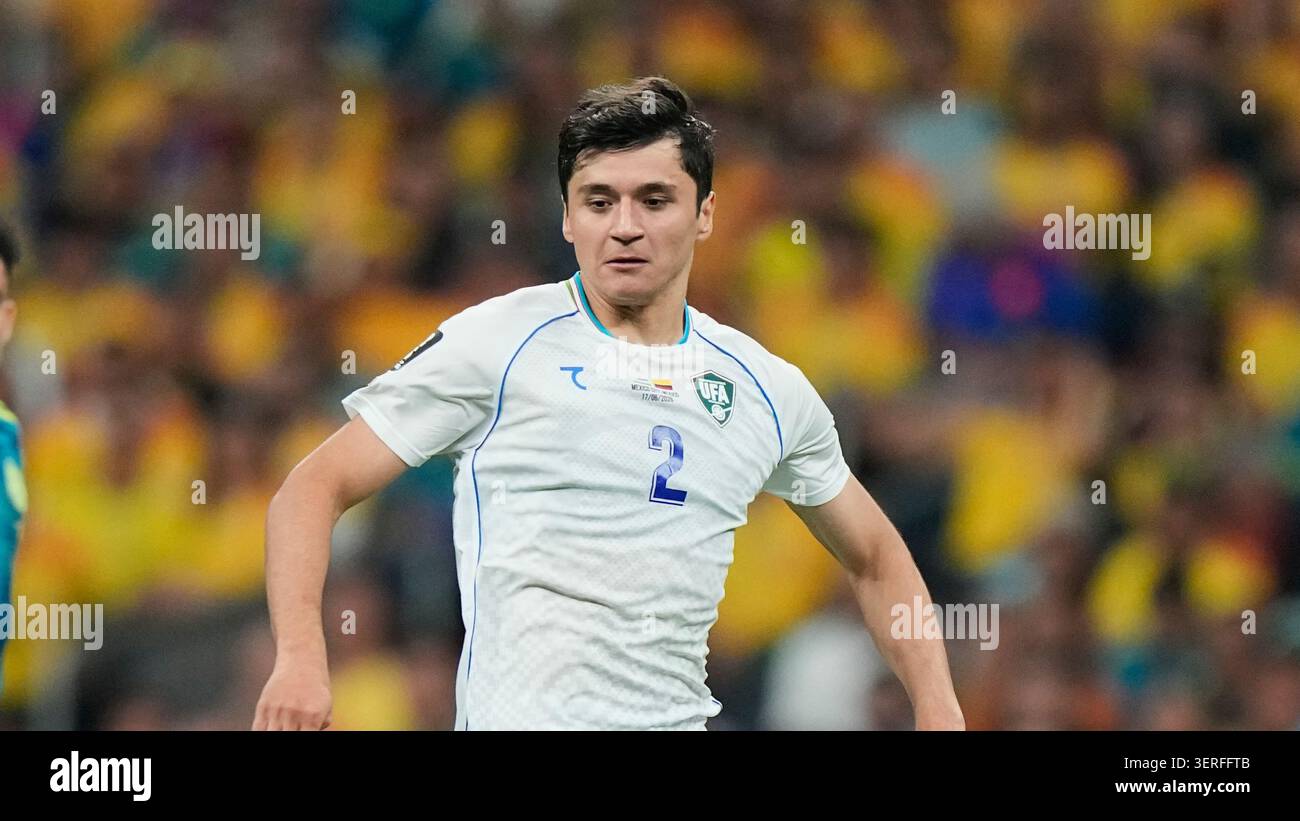 Uzbekistan's Abdukodir Khusanov (2) controls the ball during the World ...