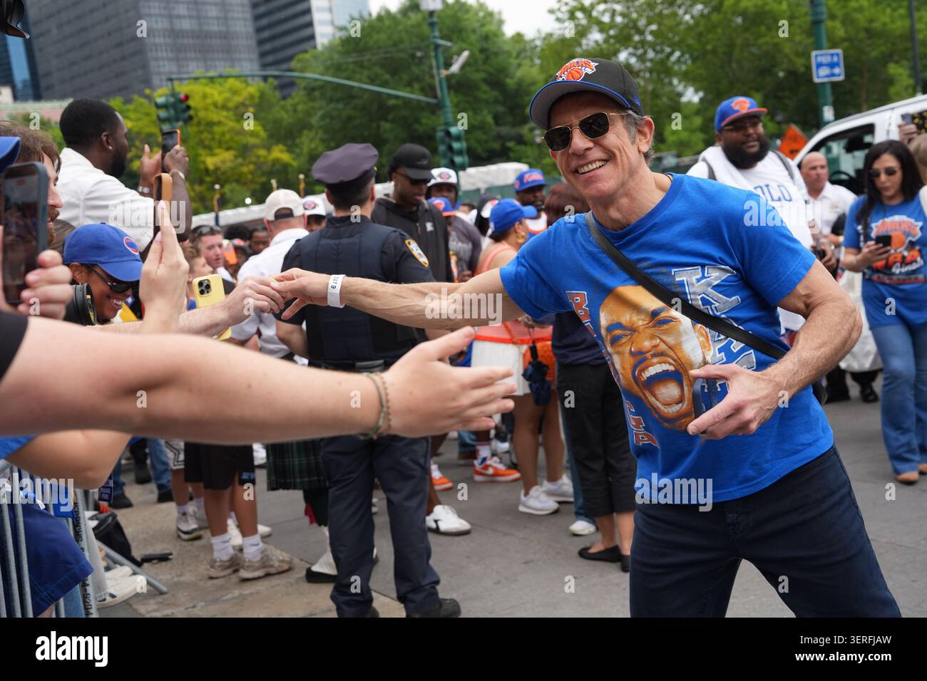 Ben Stiller shakes hands with fans during the New York Knicks' NBA ...