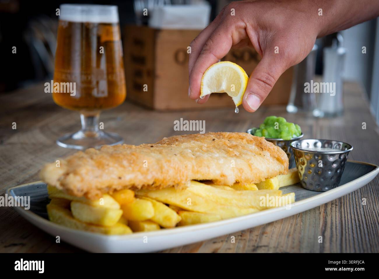 Crispy Fish and Chips Served With a Splash of Lemon for a Delightful ...