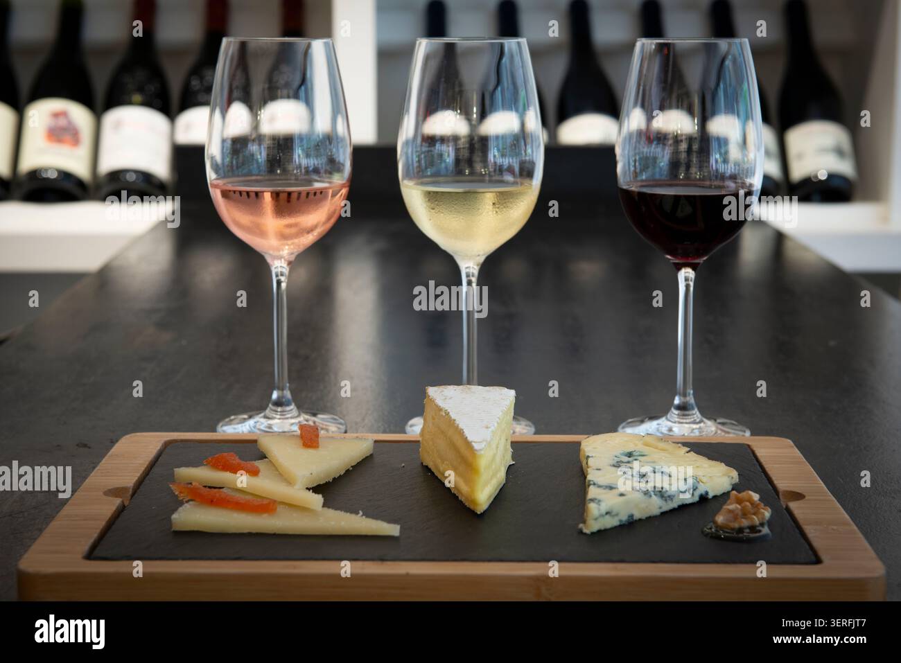 Elegant Cheese and Wine Pairing at a Charming Winery During a Sunny ...