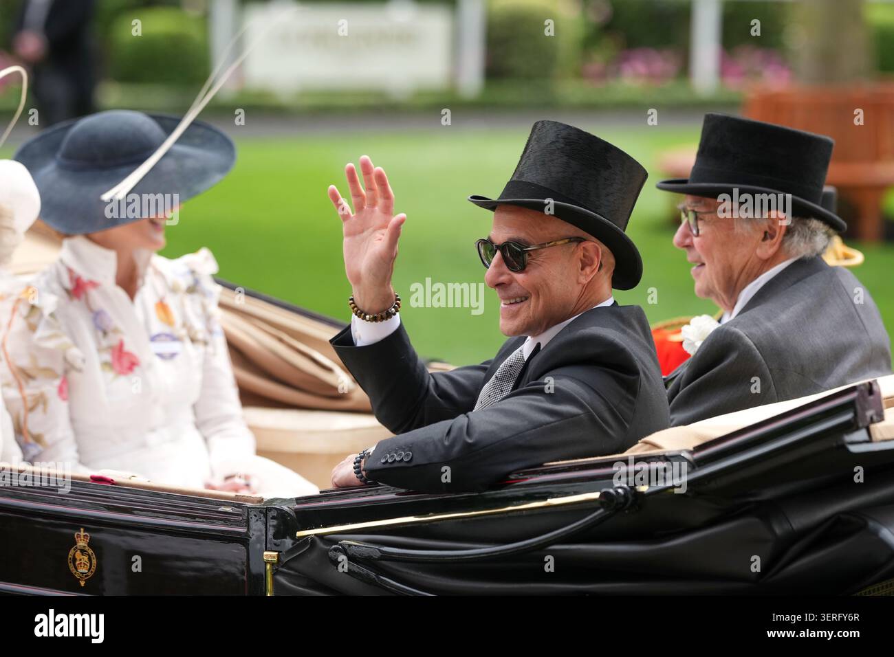 American actor Stanley Tucci waves as he rides in a carriage as he ...