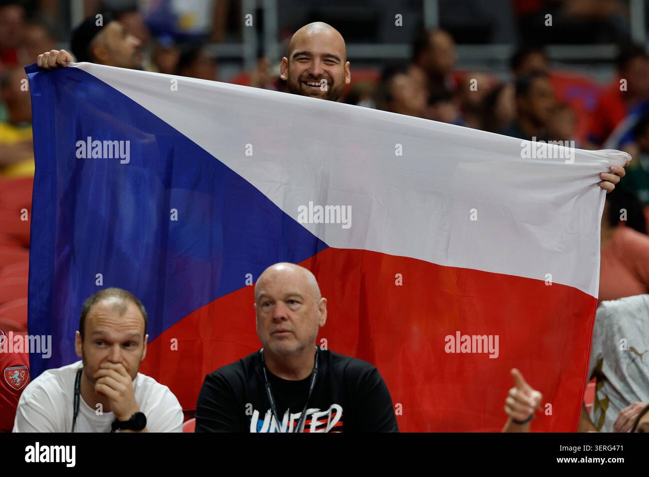 A supporter of Czechia holds a flag of his country before the World Cup ...