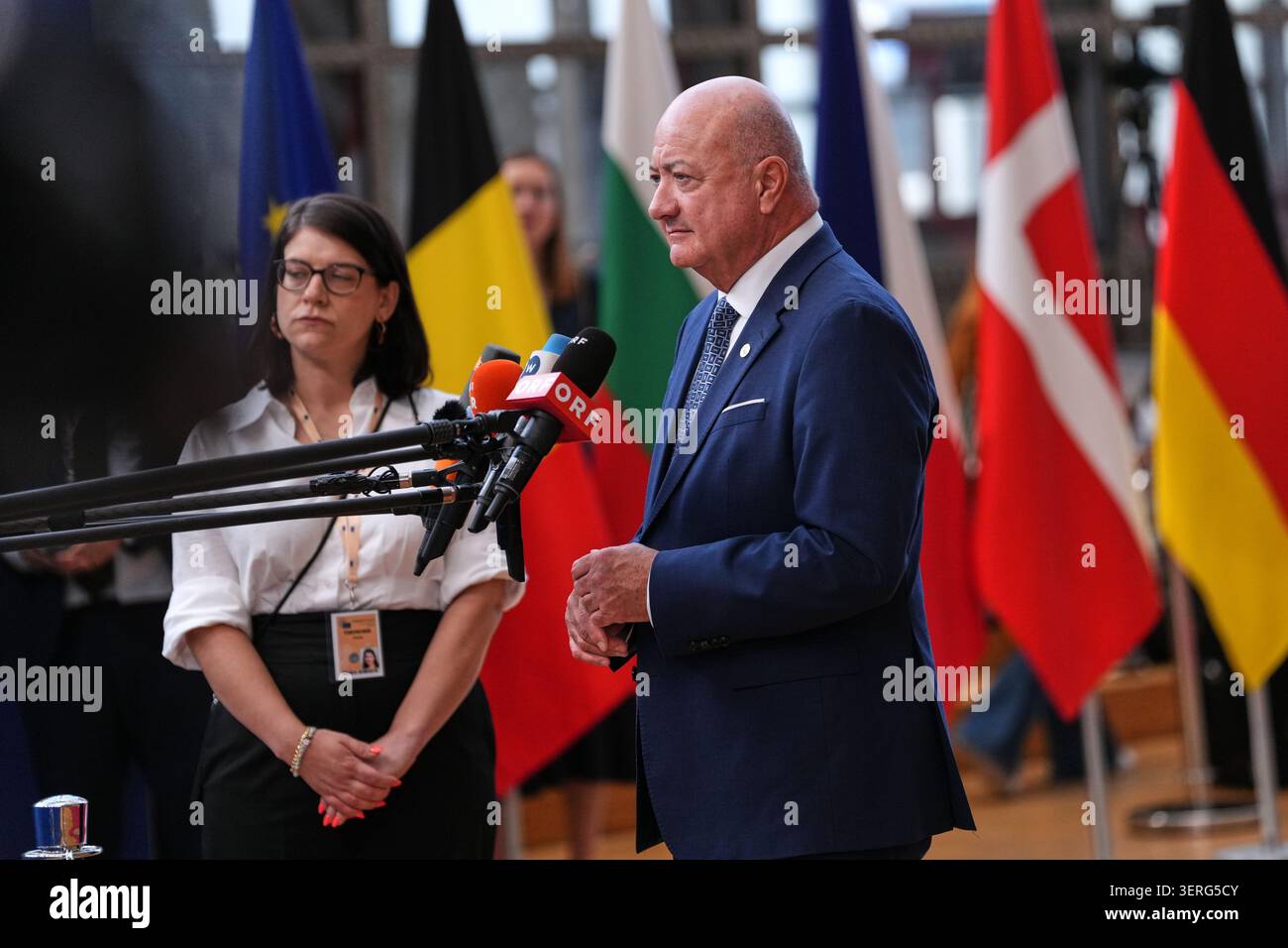 Austria's Chancellor Christian Stocker talks to journalists as he ...