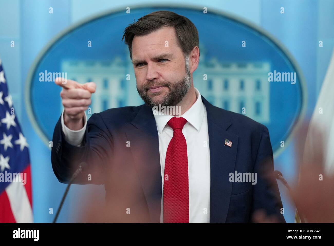 Vice President JD Vance points to a reporter to take a question in the ...