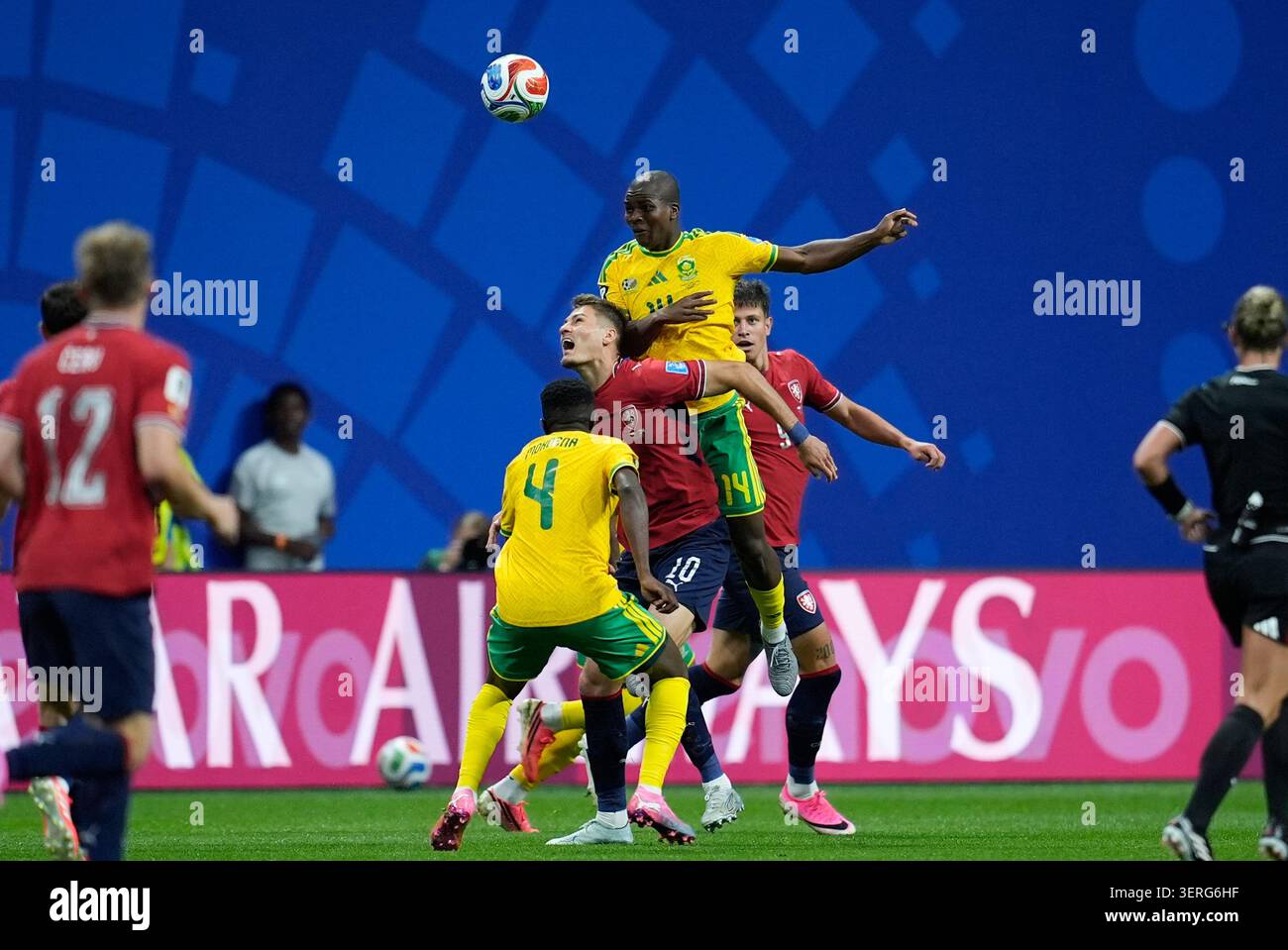 South Africa's Mbekezeli Mbokazi heads the ball above Czechia's Patrik ...