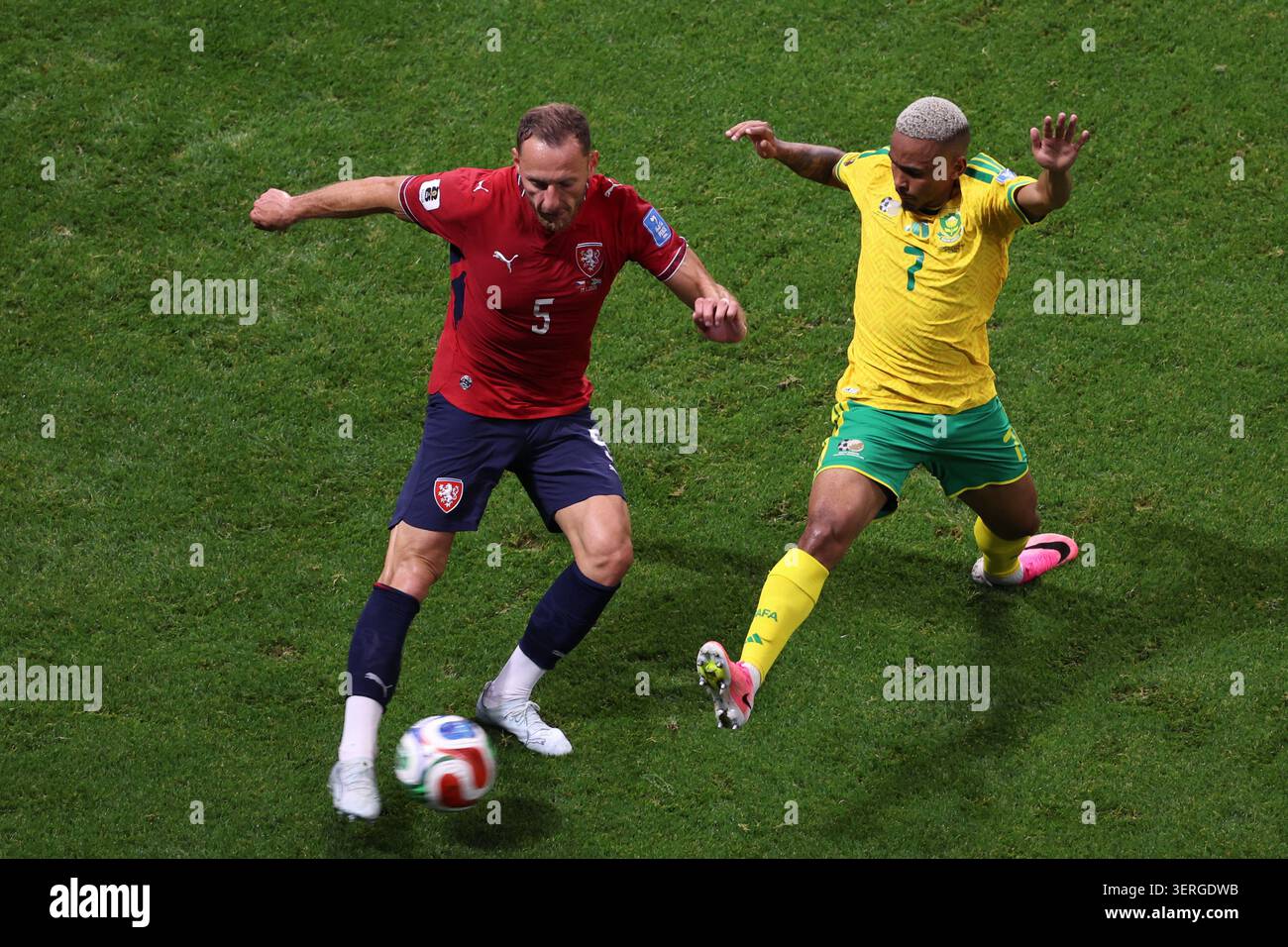 Czechia's Vladimir Coufal (5) sends a cross by South Africa's Oswin ...