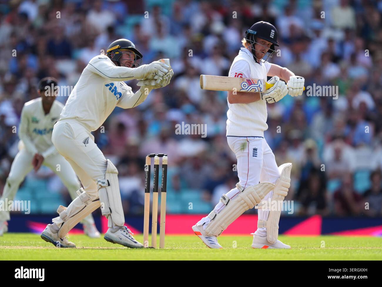 England's Jordan Cox in action with New Zealand wicketkeeper Tom ...