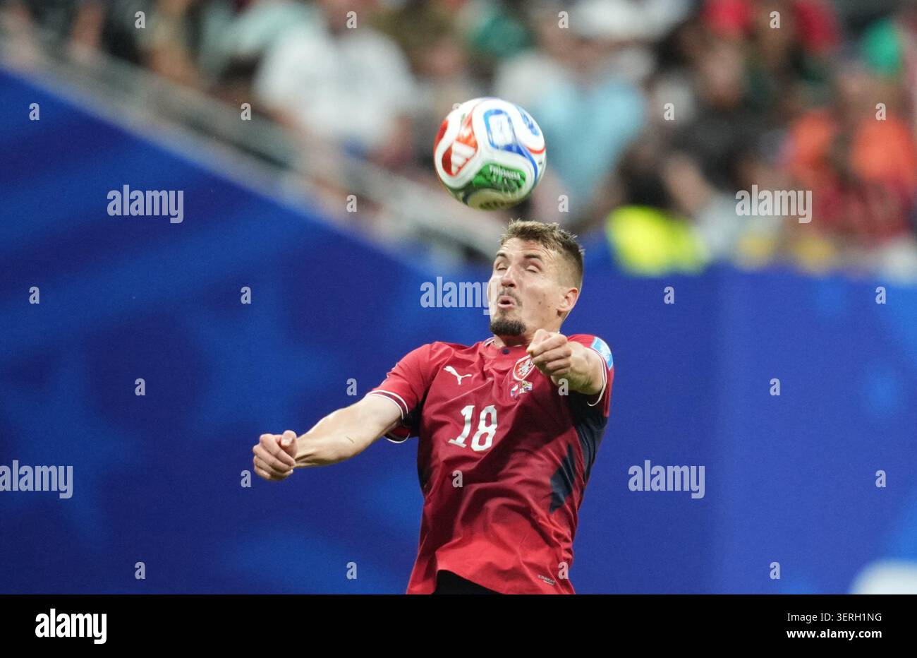 Michal Sadilek (Czechia) heads during Chezia and South Africa , Group A ...