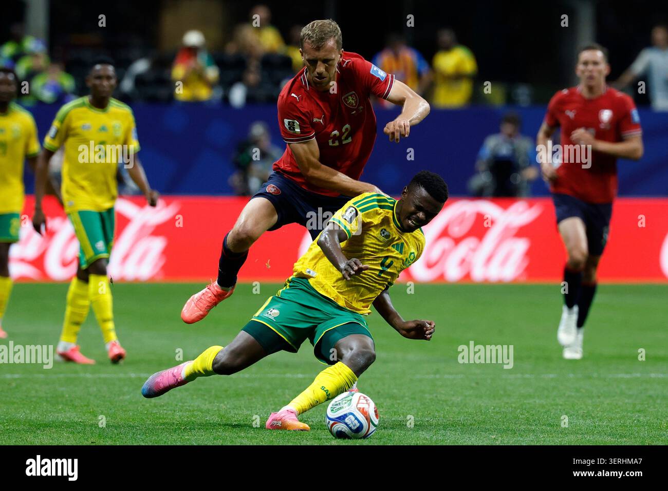 Czechia's Tomas Soucek, background, stops South Africa's Teboho Mokoena ...