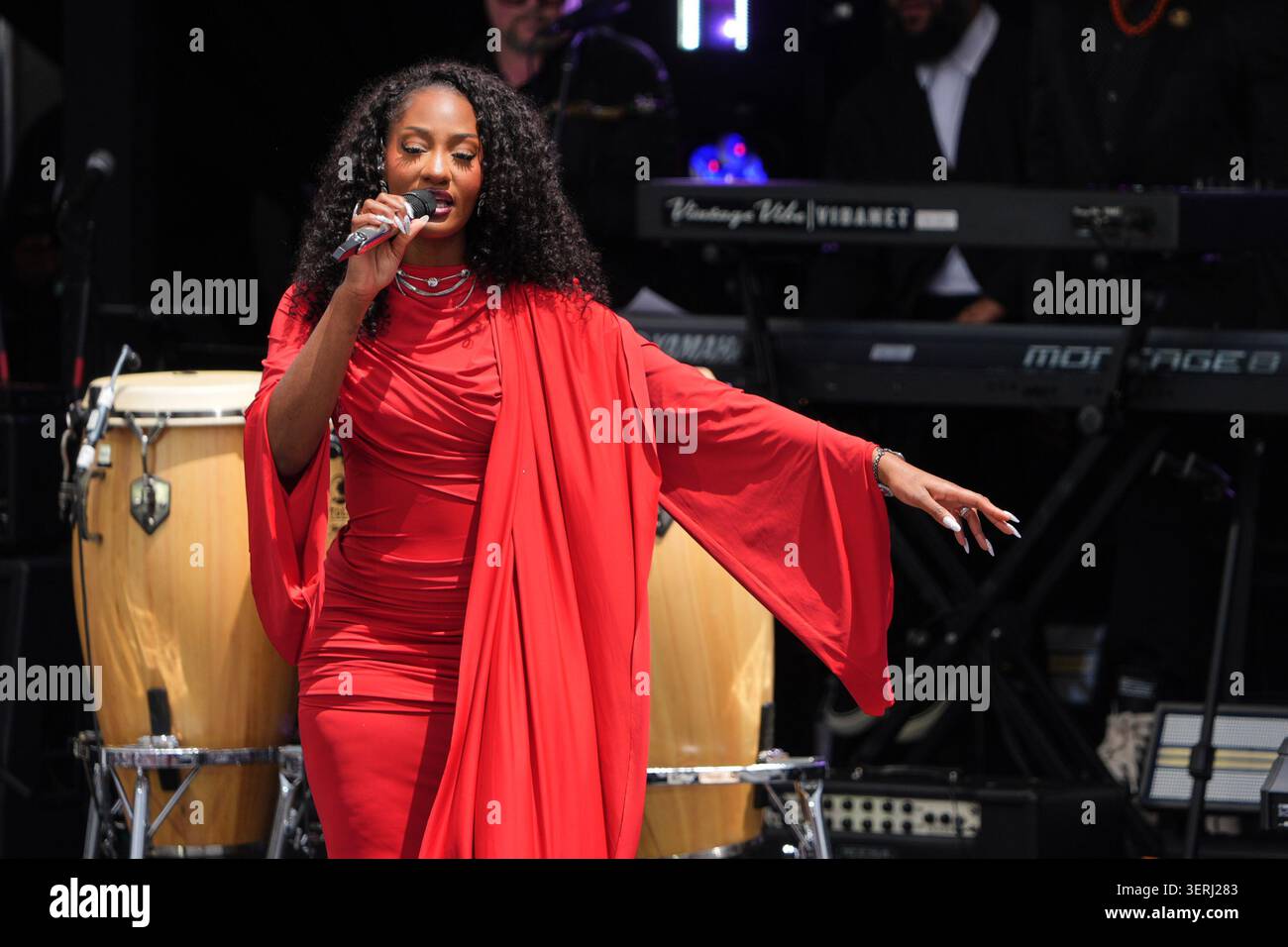 Singer Tems performs during the dedication ceremony for the Obama ...