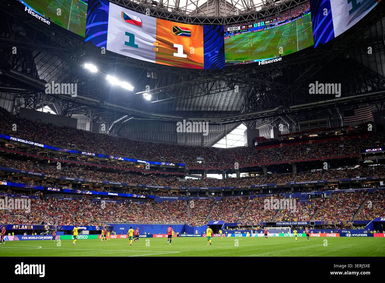 The video screen shows the score at the end of the regular time during ...