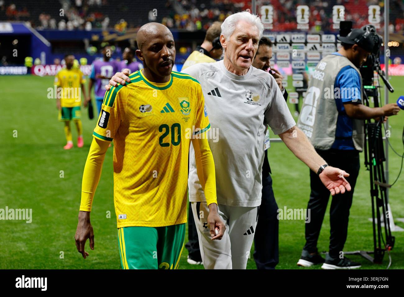 South Africa's Khuliso Mudau, left, and South Africa head coach Hugo ...