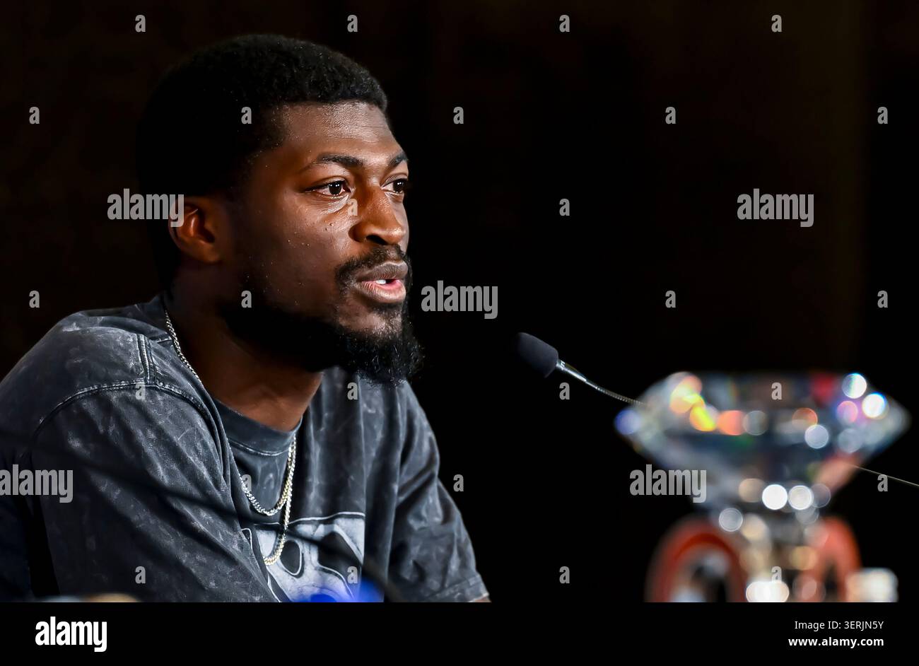 American hurdler Cordell Tinch attends a press conference ahead of the ...