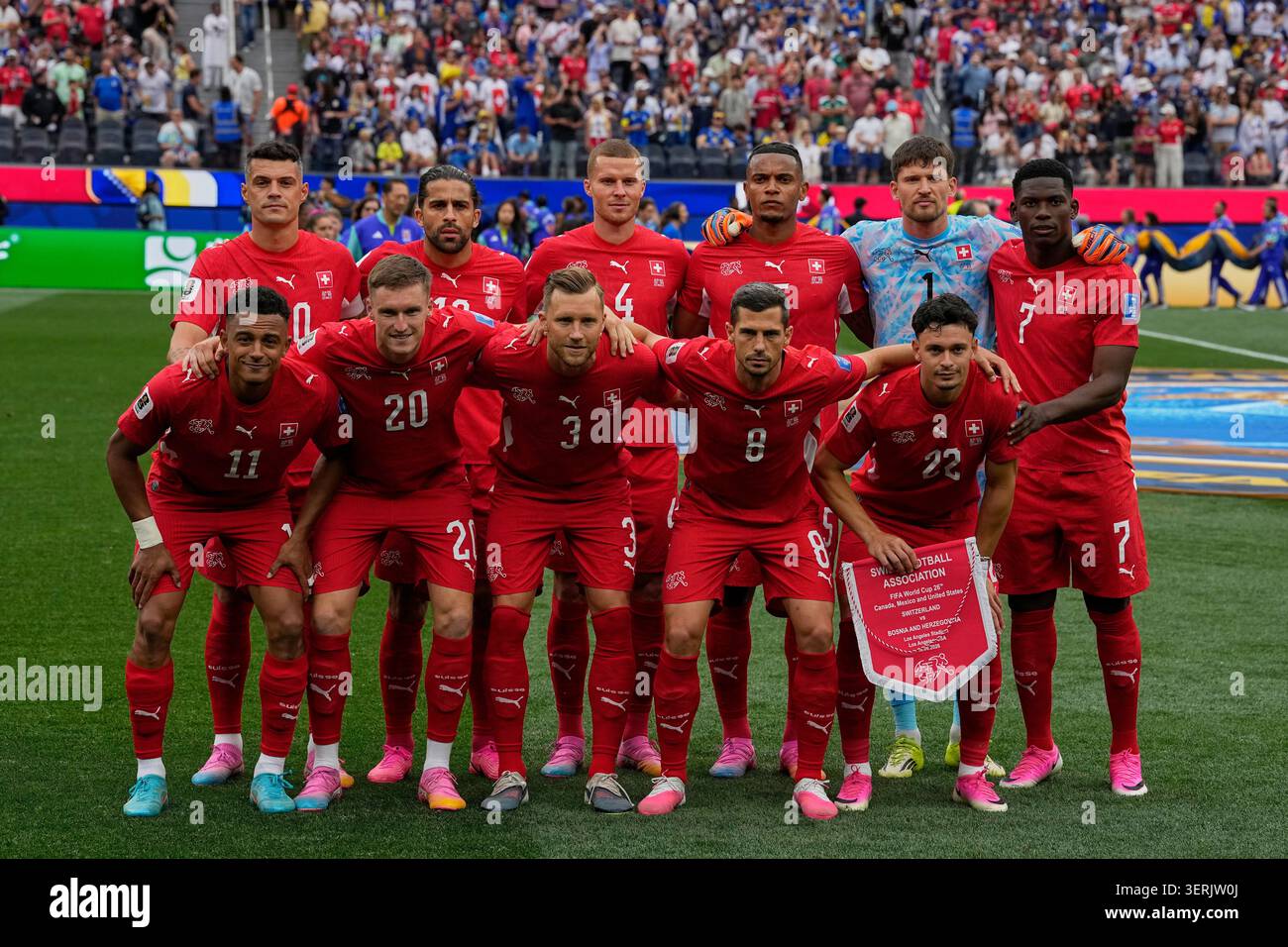 Switzerland's players pose for a team photo before the start of the ...