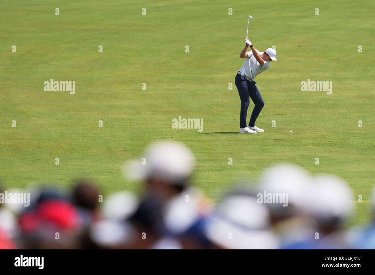 Ben James hits from the fairway on the fourth hole during the first ...