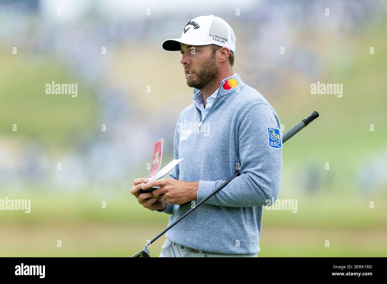 Sam Burns prepares to putt on the 1st hole during the first round of ...
