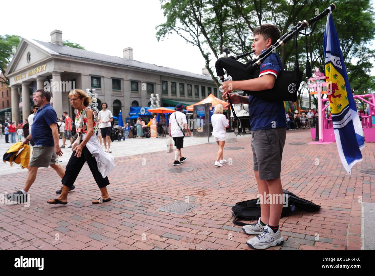 Scotland fan Finlay Ramsay playing the bagpipes at Quincy Market in ...