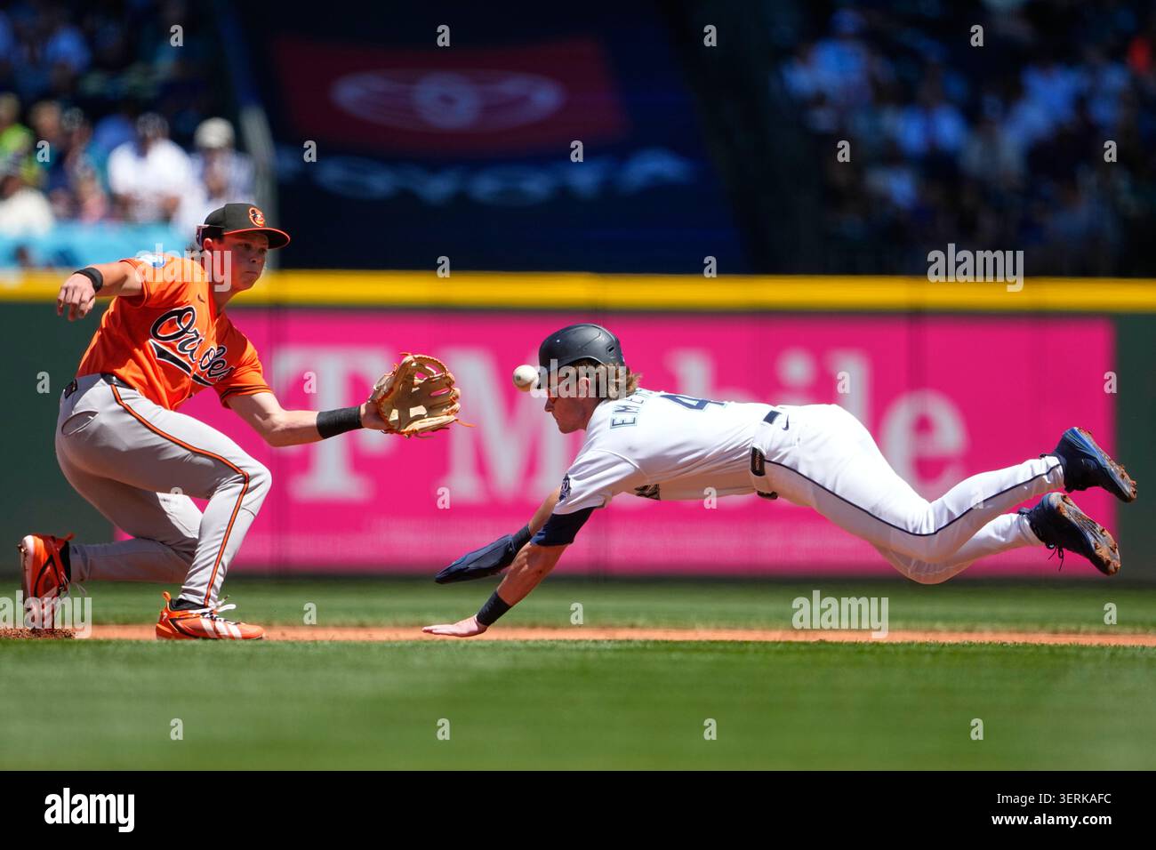 Seattle Mariners' Colt Emerson beats the throw to Baltimore Orioles ...