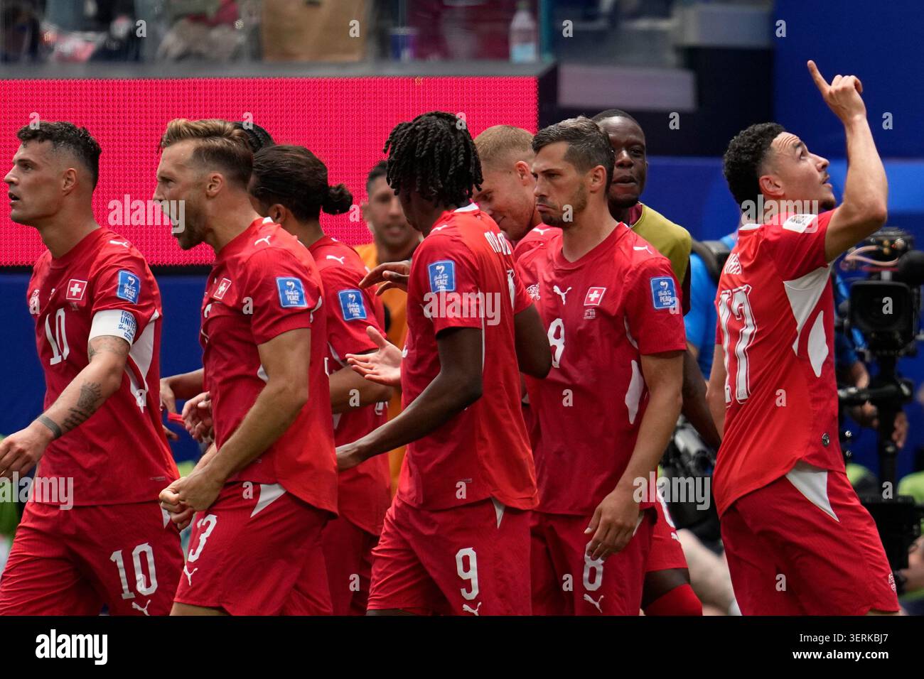 Switzerland's Ruben Vargas, right, celebrates after scoring his side's ...