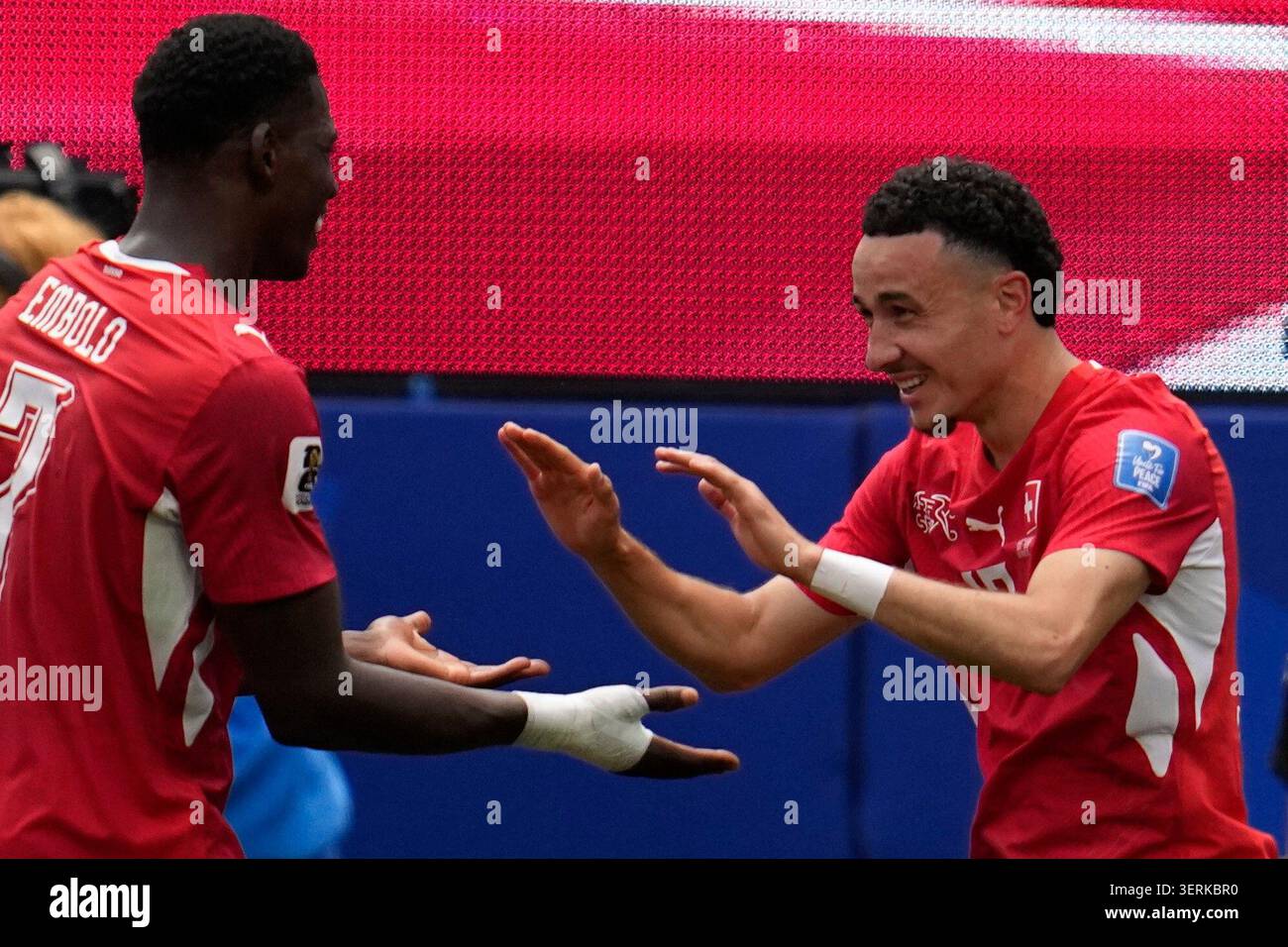 Switzerland's Ruben Vargas, right, celebrates after scoring his side's ...