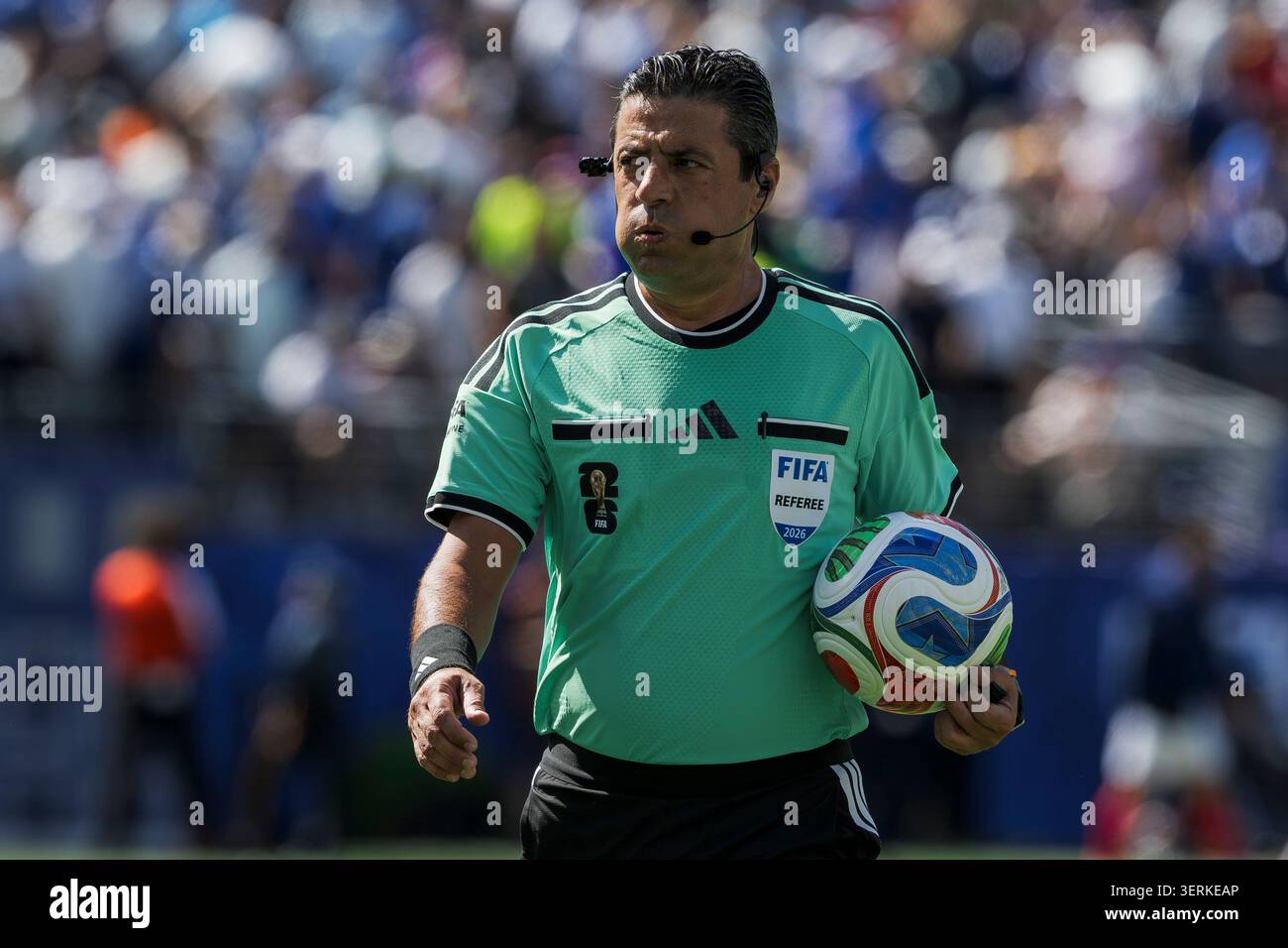 Referee Alireza Faghani holds the ball during the FIFA World Cup 2026 ...