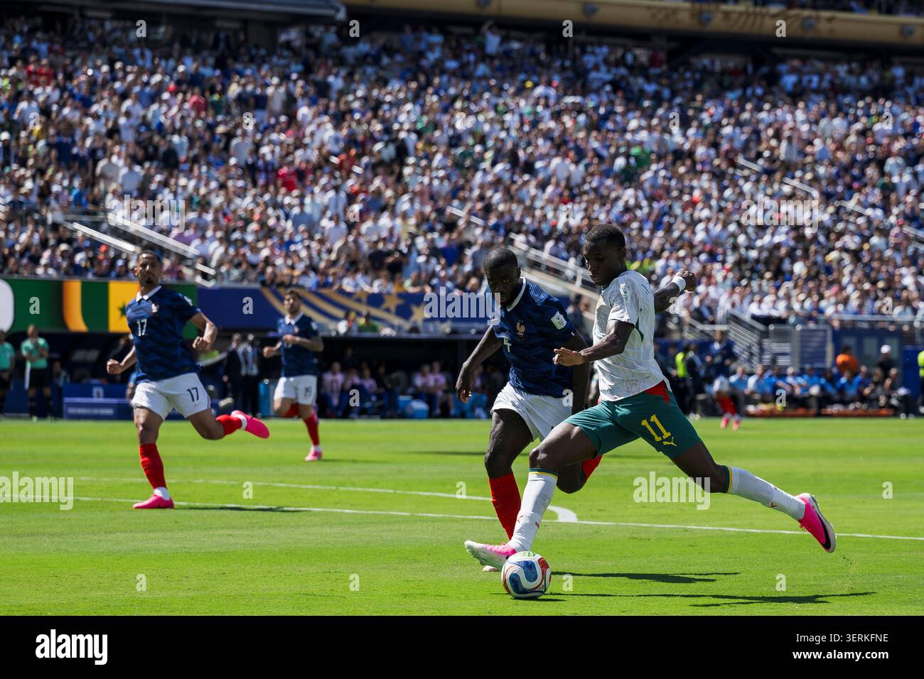 Nicolas Jackson of Senegal competes for the ball with Dayot Upamecano ...