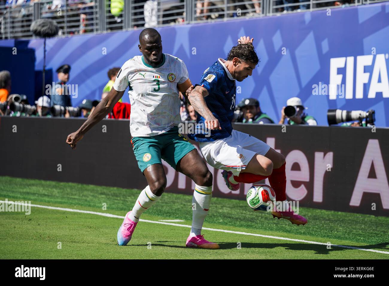 Theo Hernandez of France competes for the ball with Kalidou Koulibaly ...