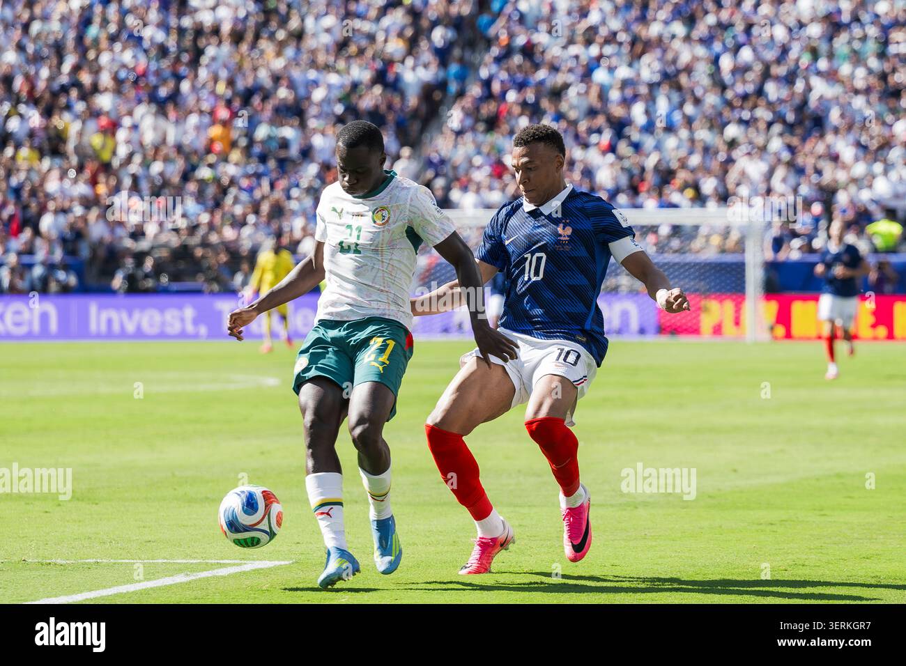 Habib Diarra of Senegal competes for the ball with Kylian Mbappe of ...