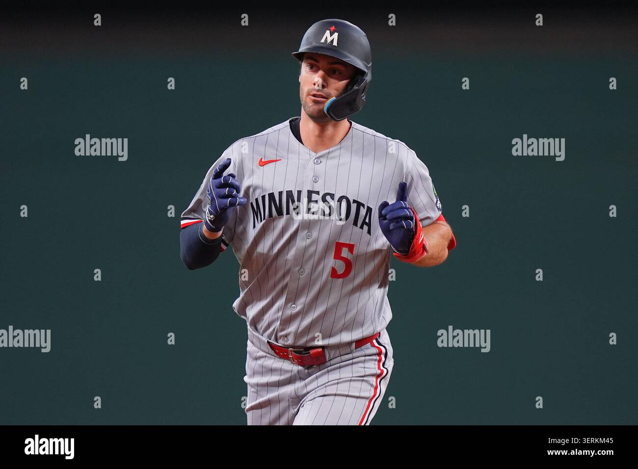 Minnesota Twins' Ryan Kreidler gestures as he runs the bases after ...