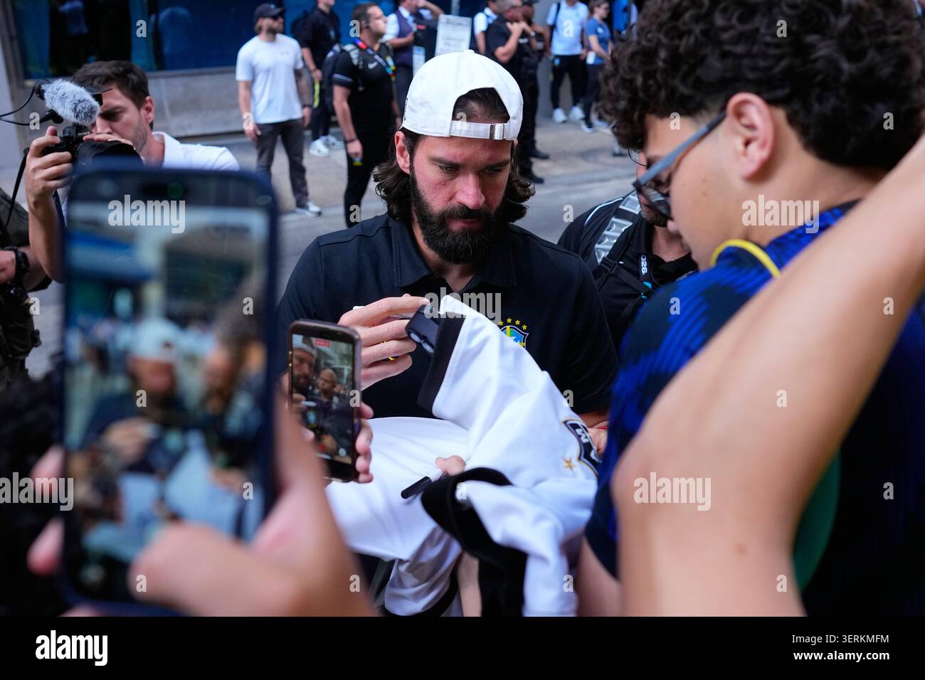 Brazil goalkeeper Alisson Becker meets his fans upon arrival in ...