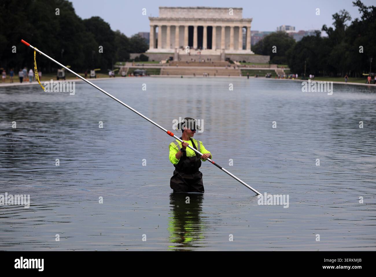 Members of the National Park Service clean algae from the Lincoln ...