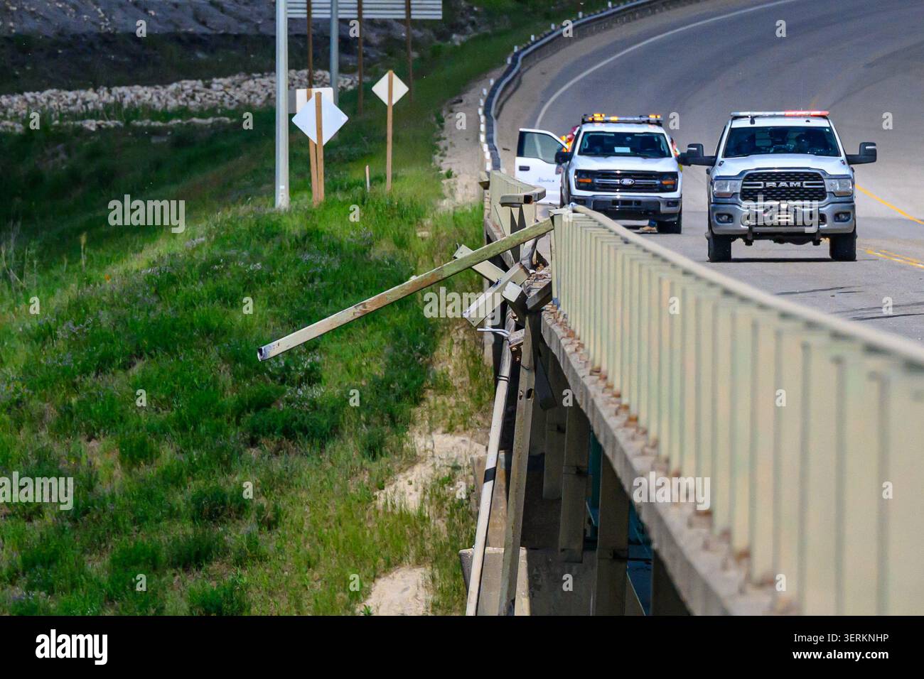 A damaged guardrail is pictured on the Wapiti River Bridge after a ...