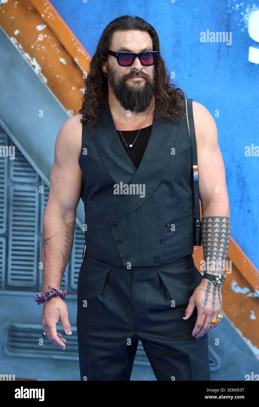 Jason Momoa attends the UK sneak peak fan event for the movie Supergirl ...