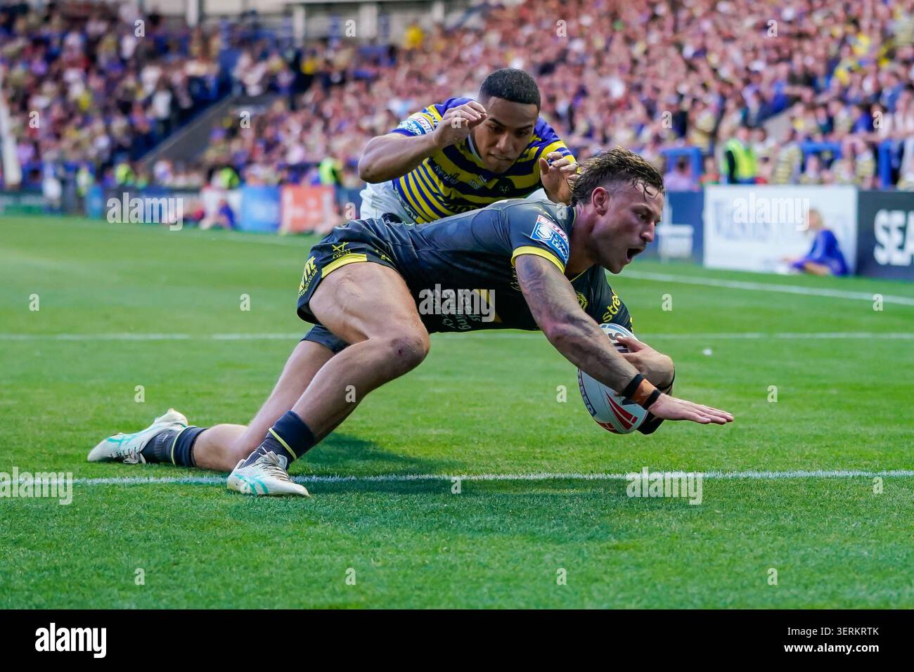 WARRINGTON, ENGLAND - June 18: Chris Hankinson of Leeds scores during ...