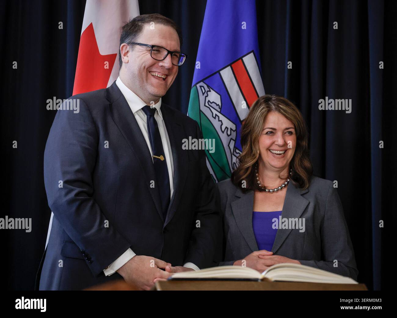 Alberta Premier Danielle Smith, right, stands with new Minister of ...