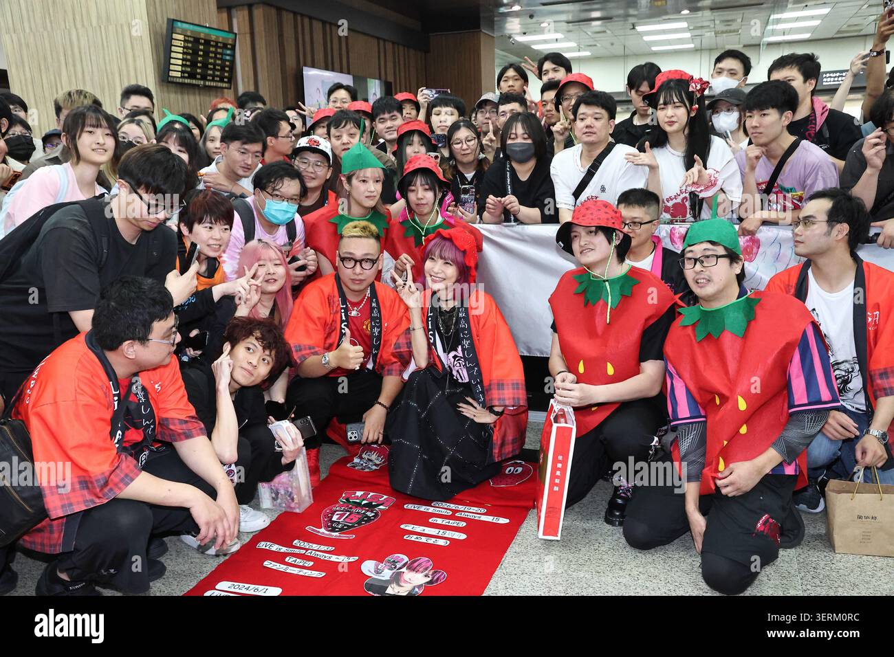 TAIPEI, CHINA - JUNE 18, 2026 - Fans welcome Japanese rock singer LiSA ...