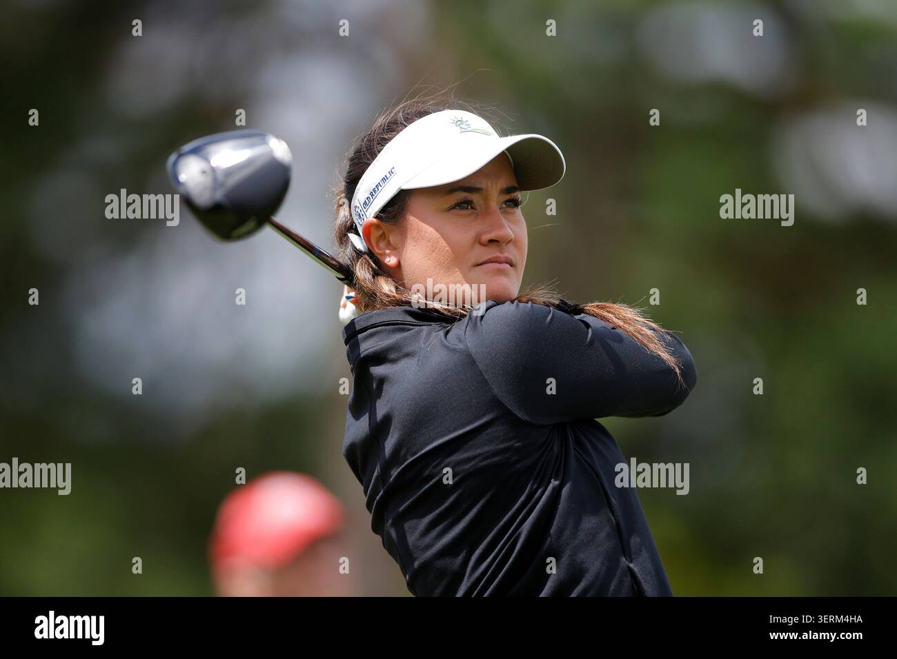 Kiara Romero watches her tee shot on the ninth hole during the first ...