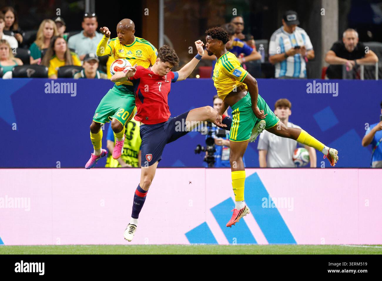 South Africa's Khuliso Mudau and Ime Okon battle for a head ball with ...