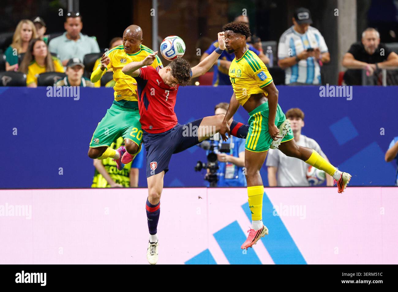 South Africa's Khuliso Mudau and Ime Okon battle for a head ball with ...