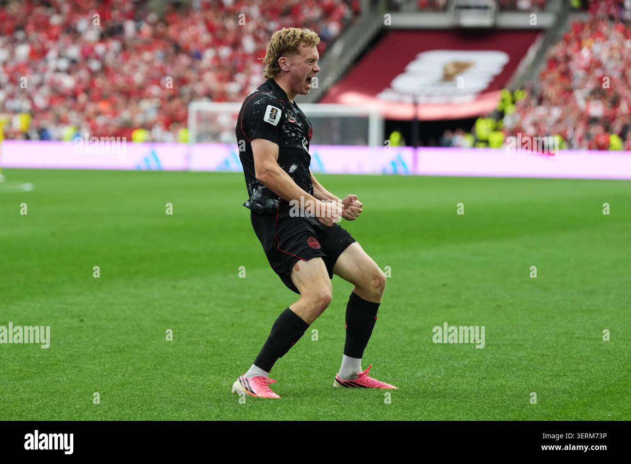 Canada's Jacob Shaffelburg celebrates after Qatar's Mohamed Manai ...