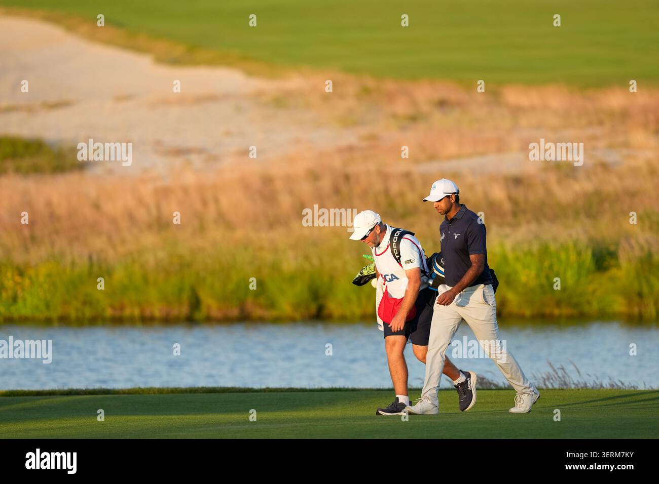 Aaron Rai, of England, walks to the green on the sixth hole during the ...
