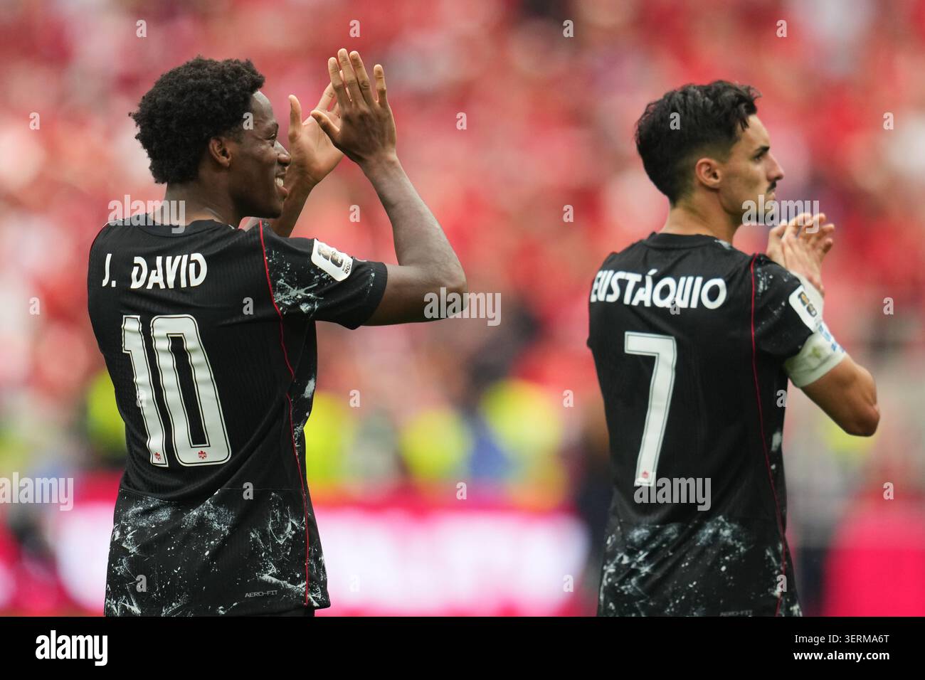 Canada's Jonathan David, left, and Stephen Eustaquio celebrate their ...