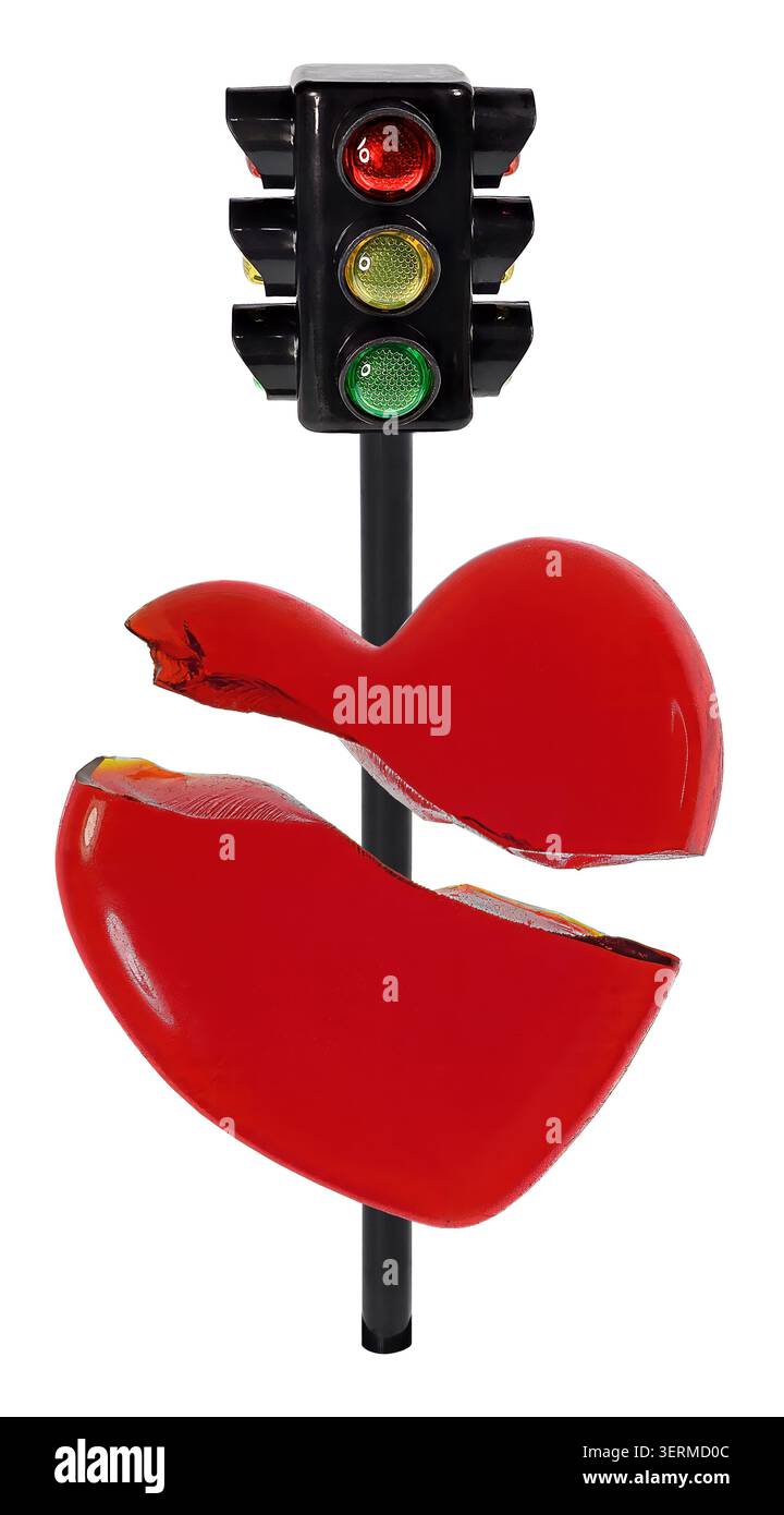 Heart stopping news with a traffic light and a Large glass broken heart ...
