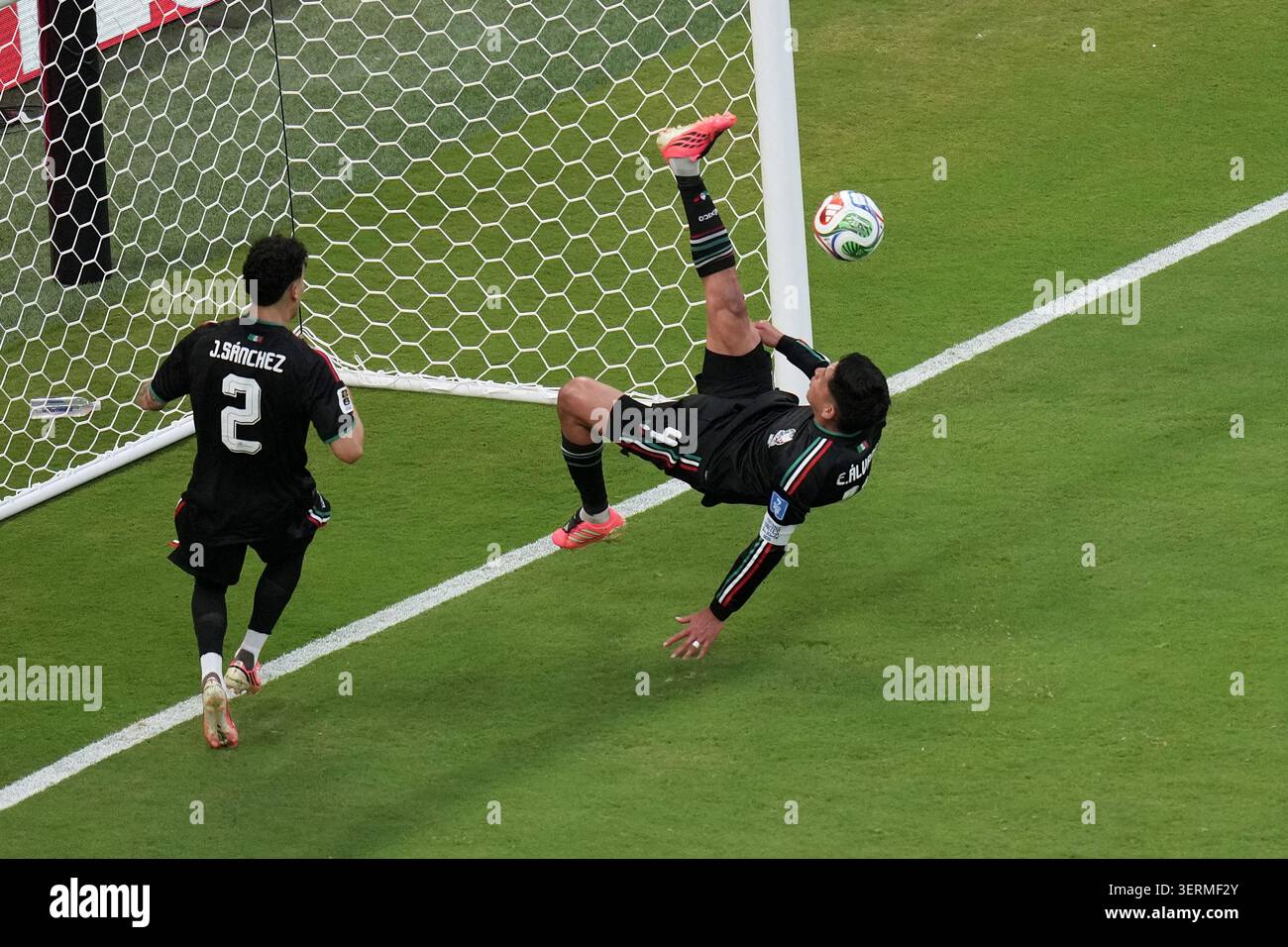 Mexico's Edson Alvarez, right, defends against a kick by South Korea ...