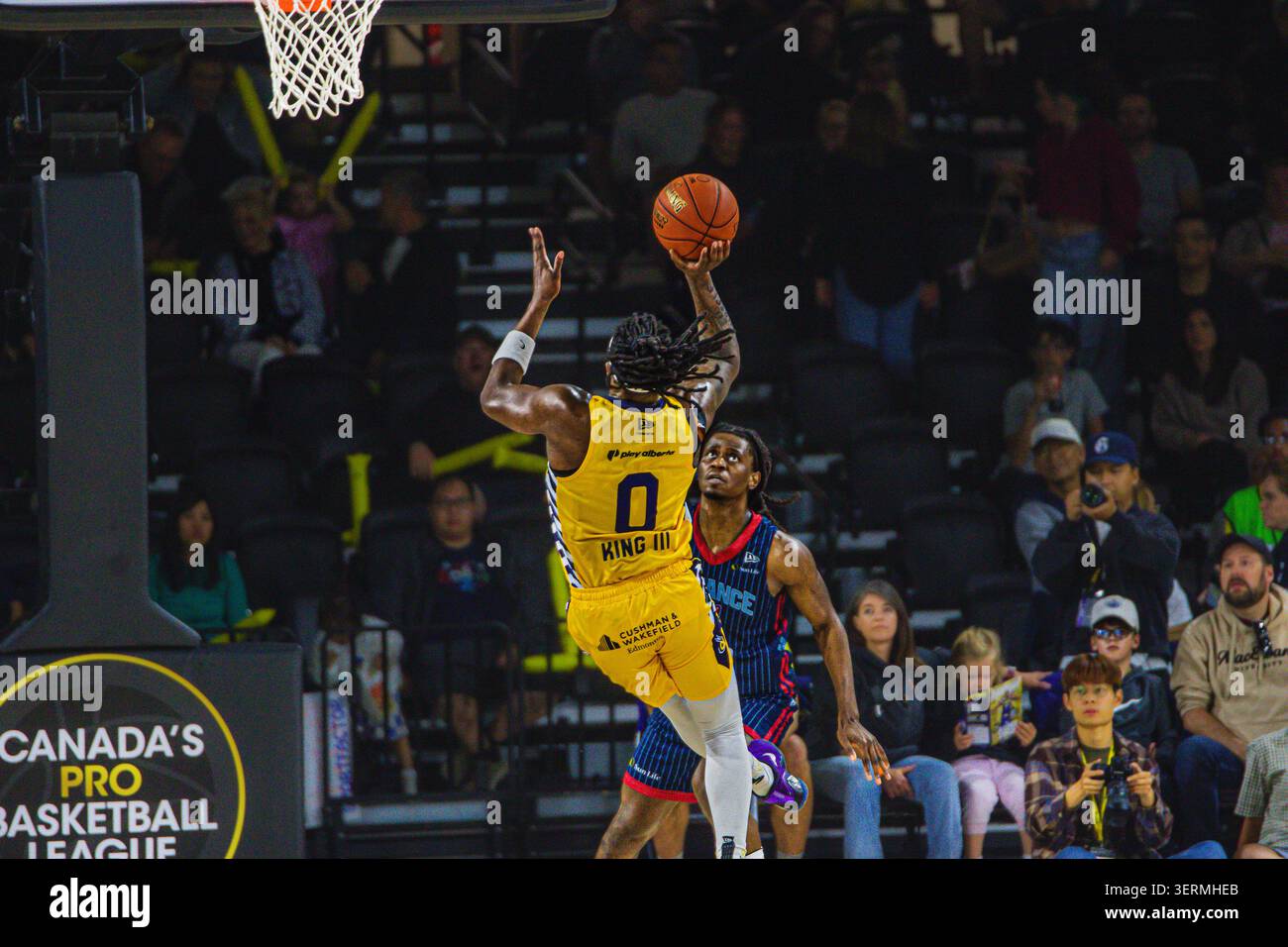 Edmonton Stinger Trey King III (0) gets up for 2 points during in the ...