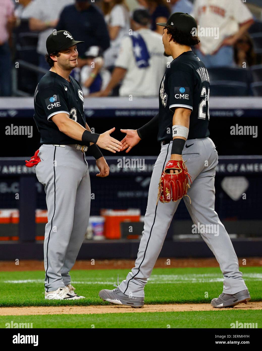 Chicago White Sox's Andrew Benintendi, left, and Miguel Vargas, right ...