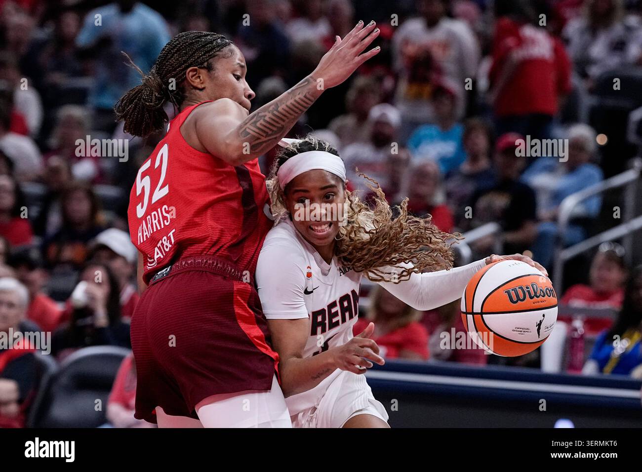 Atlanta Dream guard Jordin Canada, right, drives under Indiana Fever ...