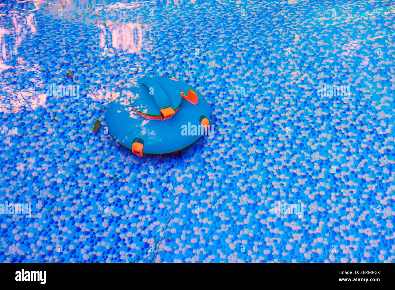 Robotic vacuum float activity in clear water of swimming pool ...