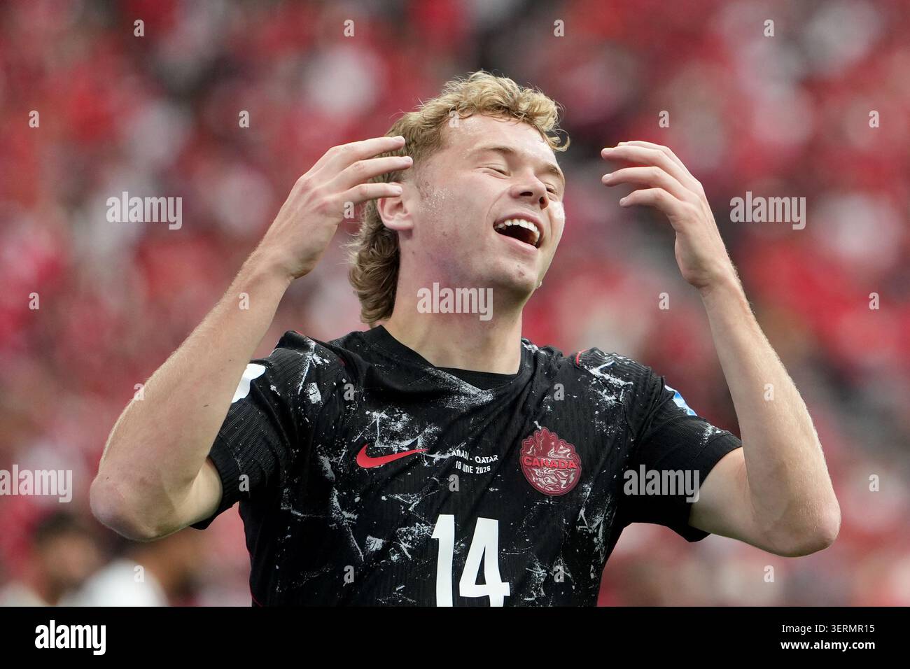 Canada's Jacob Shaffelburg (14) reacts to a missed shot on goal during ...